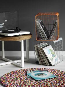 The simplicity of wire and a pop of colour make for storage and decor ...