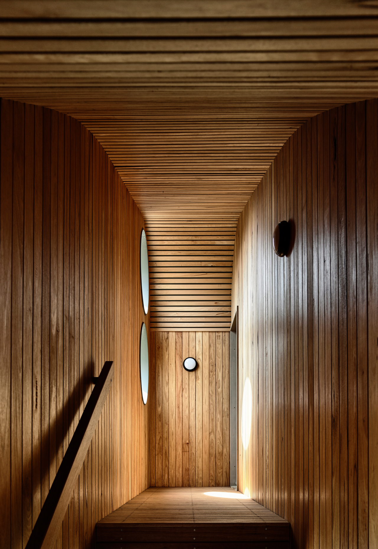 Green timber panels star in celebrated coastal home - The Interiors Addict