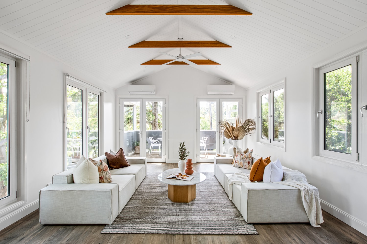 Shingles star in modern farmhouse's moody exterior - The Interiors Addict