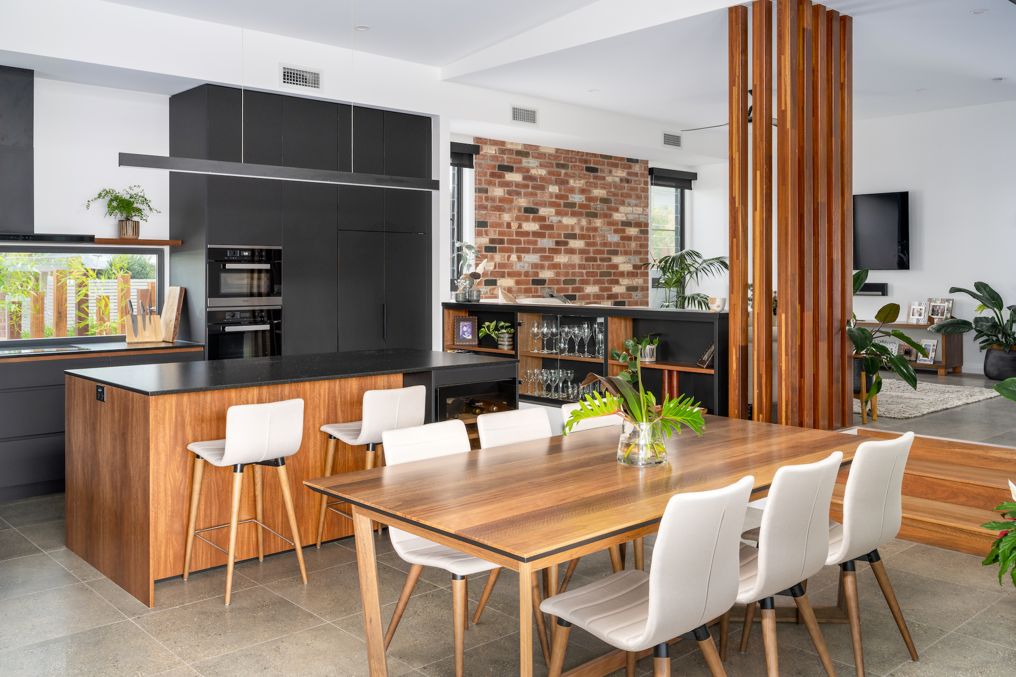 Stylish downsizer: Statement brick and timber star in new build - The ...