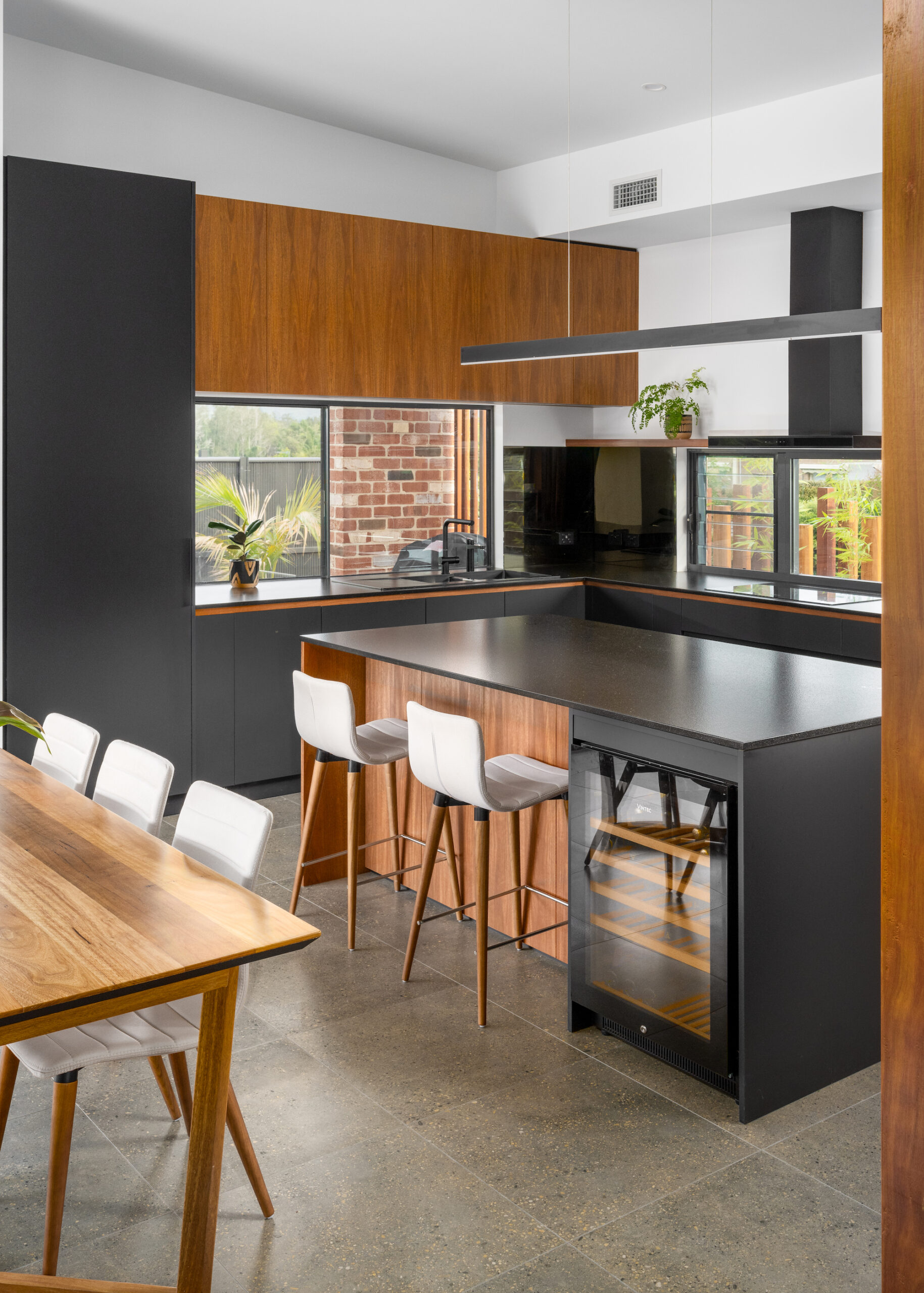 Stylish downsizer: Statement brick and timber star in new build - The ...