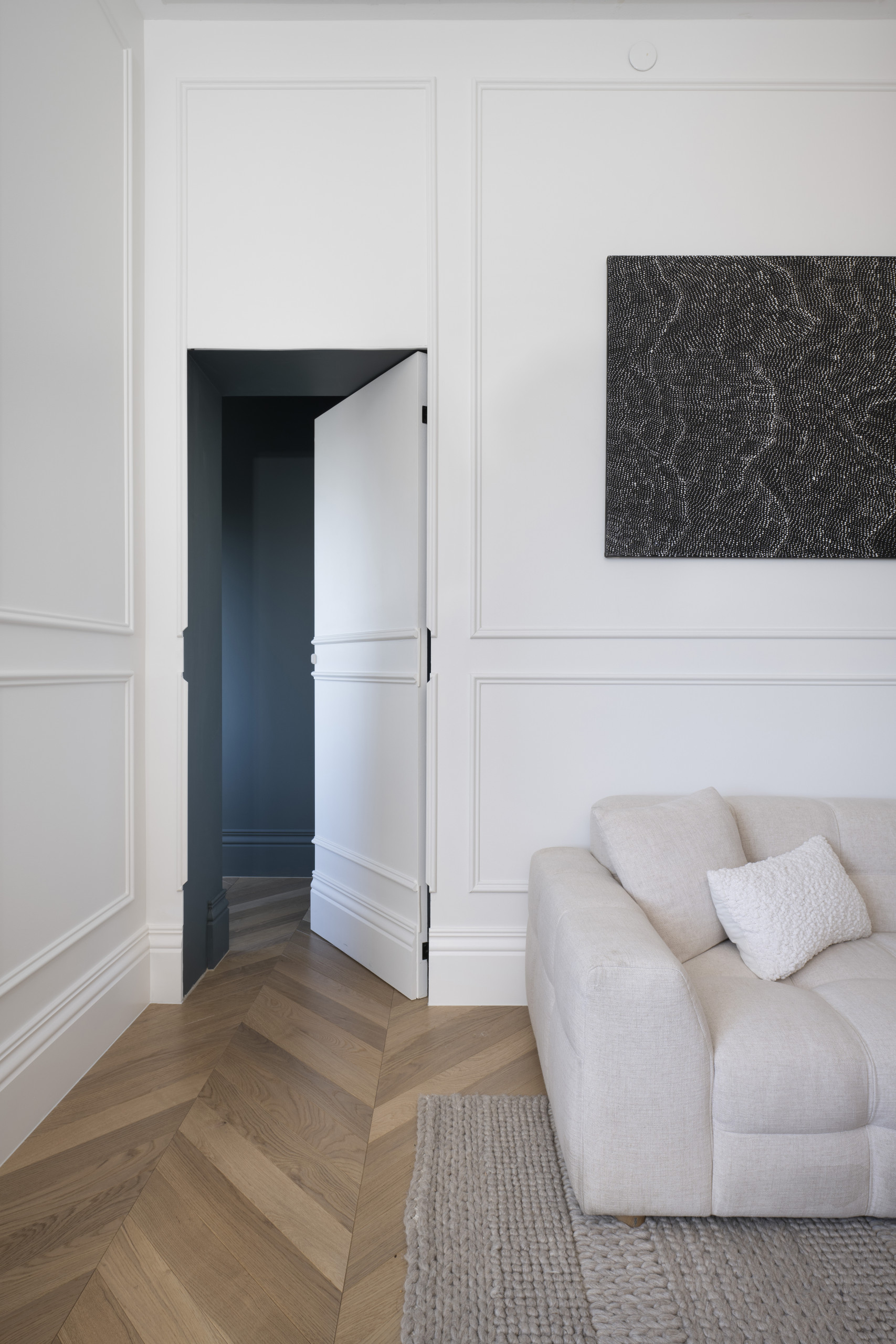 Mouldings add character and secret door in stunning apartment - The ...