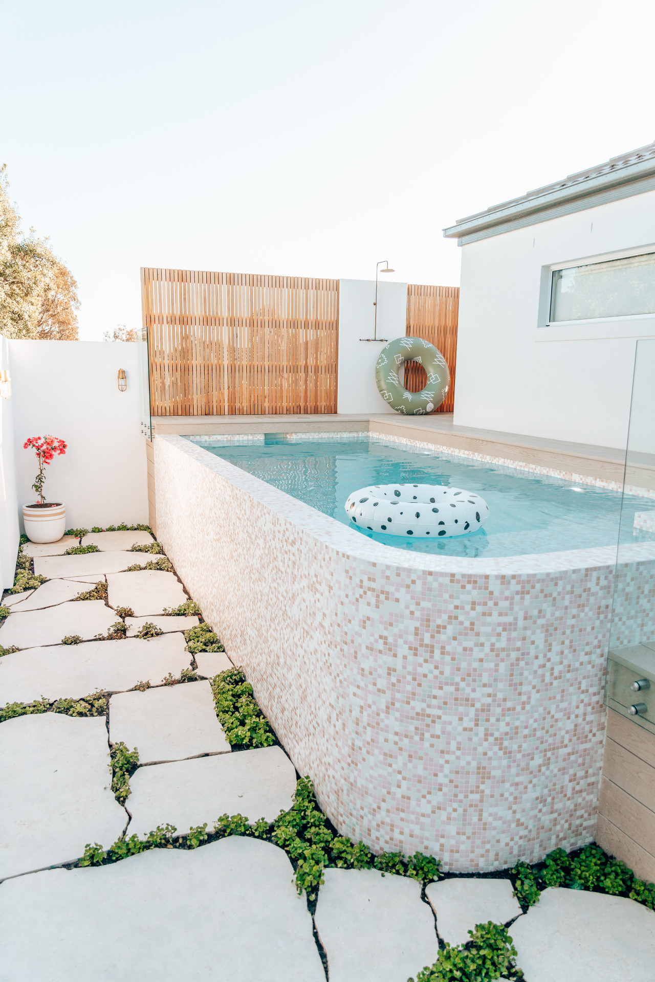 A pretty pink plunge pool renovation in Melbourne - The Interiors Addict