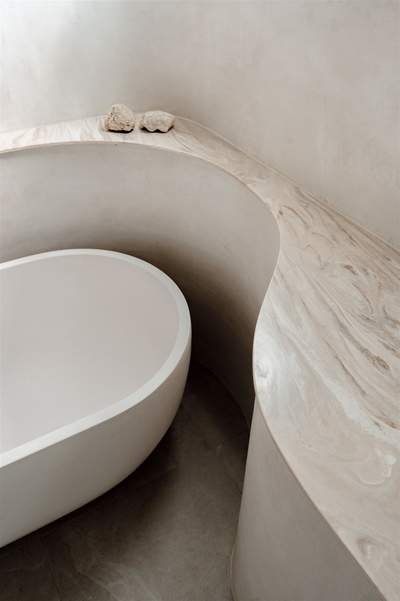 Stunning curved ledge and Venetian plaster create spa like feel - The ...