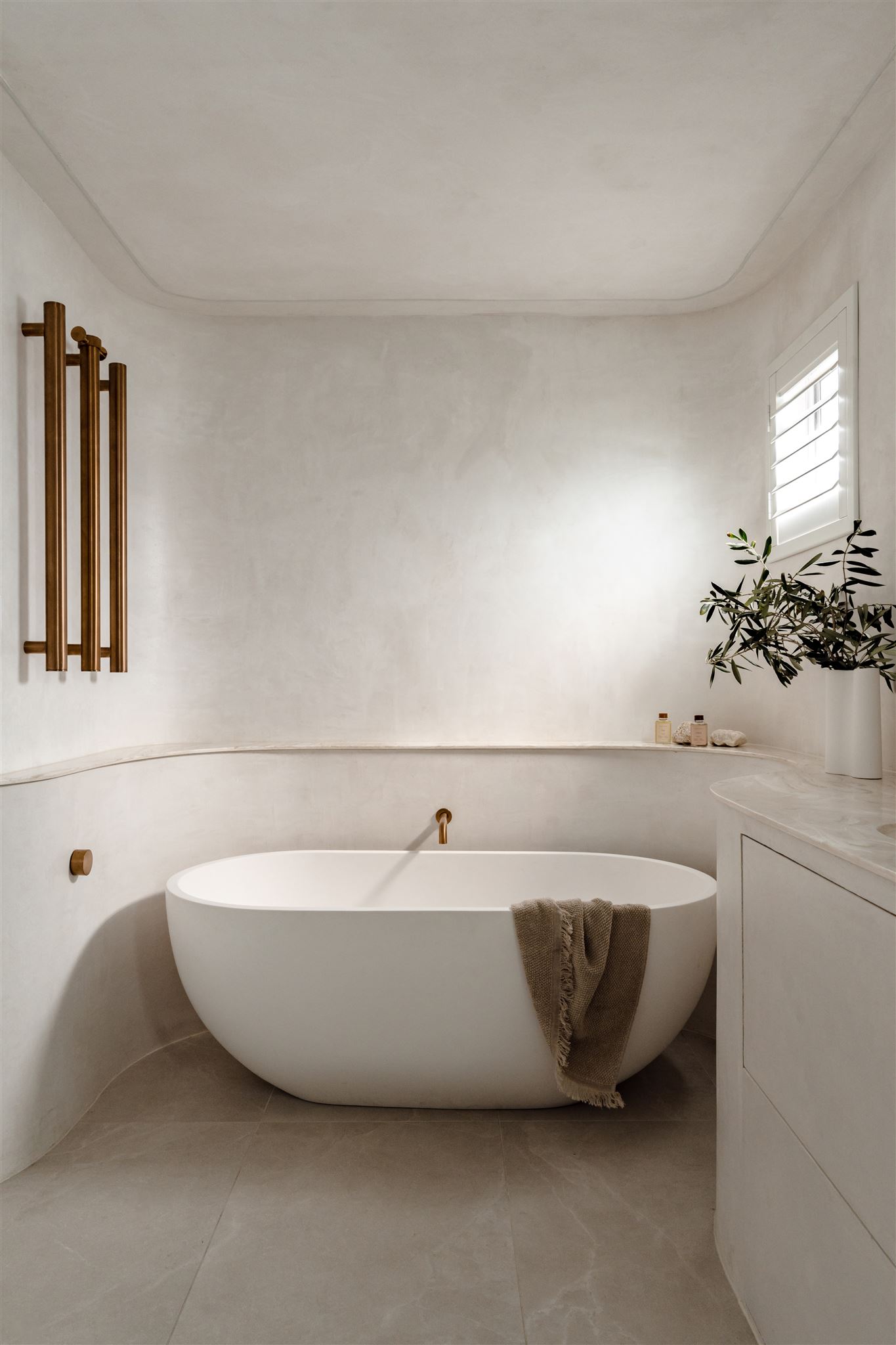 Stunning curved ledge and Venetian plaster create spa like feel - The ...