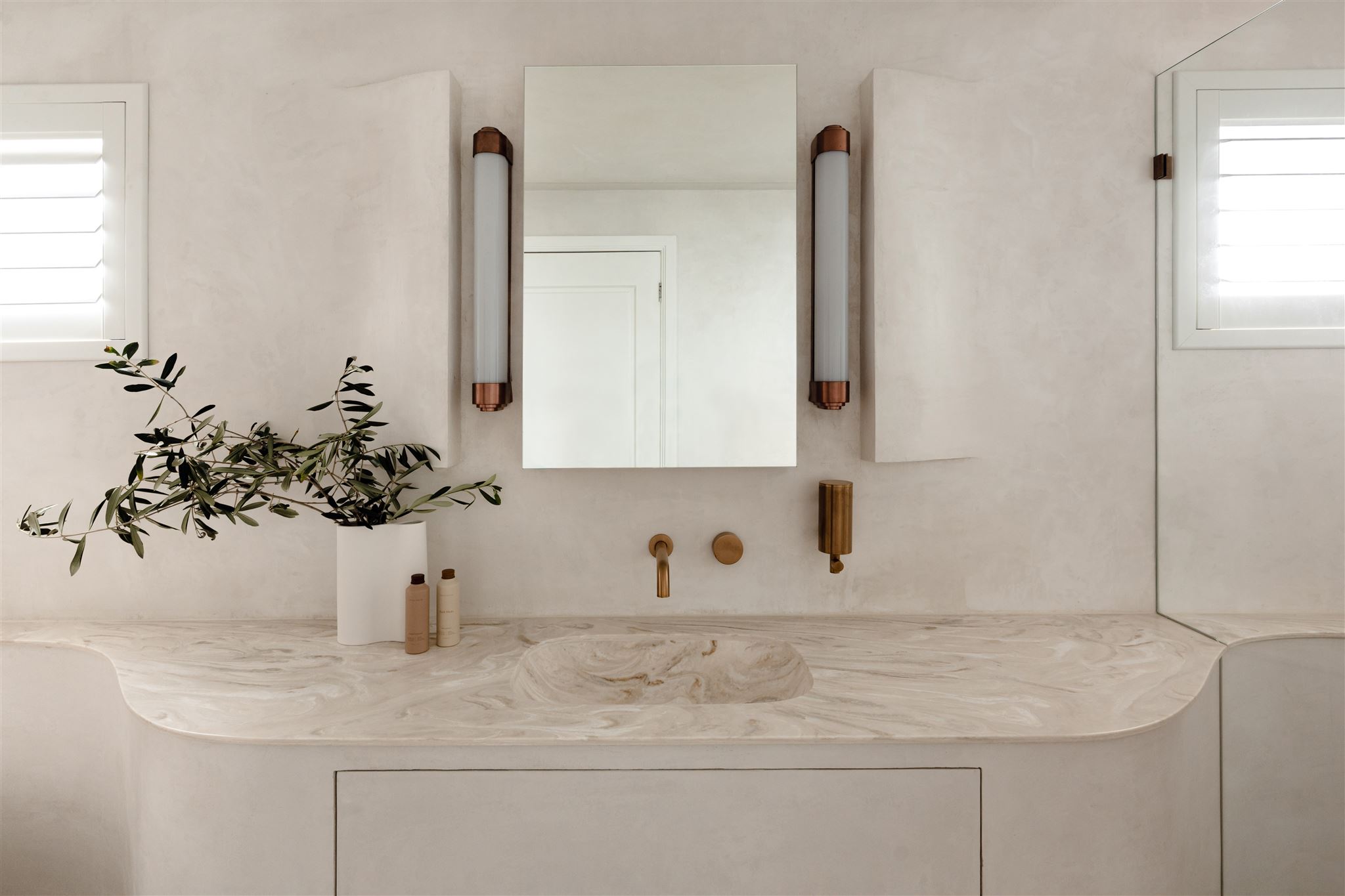 Stunning curved ledge and Venetian plaster create spa like feel - The ...