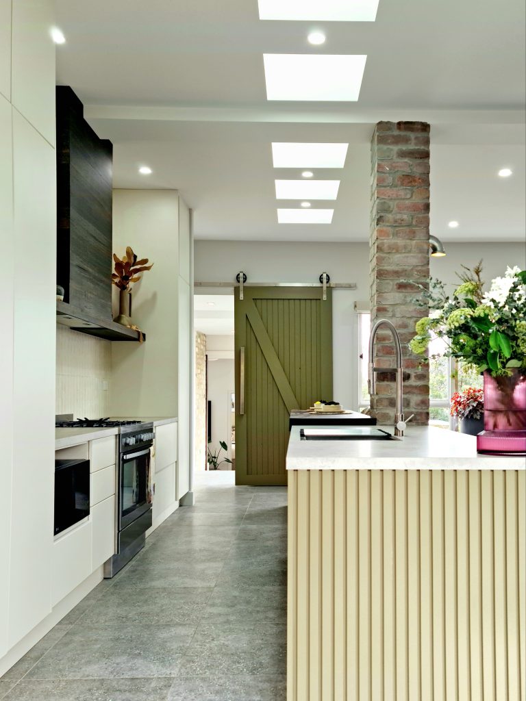 DIY kitchen makes feature of support beam with recycled brick - The ...