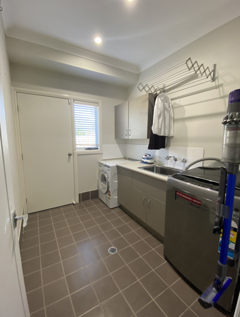 Stylish laundry no longer hidden behind a door - The Interiors Addict