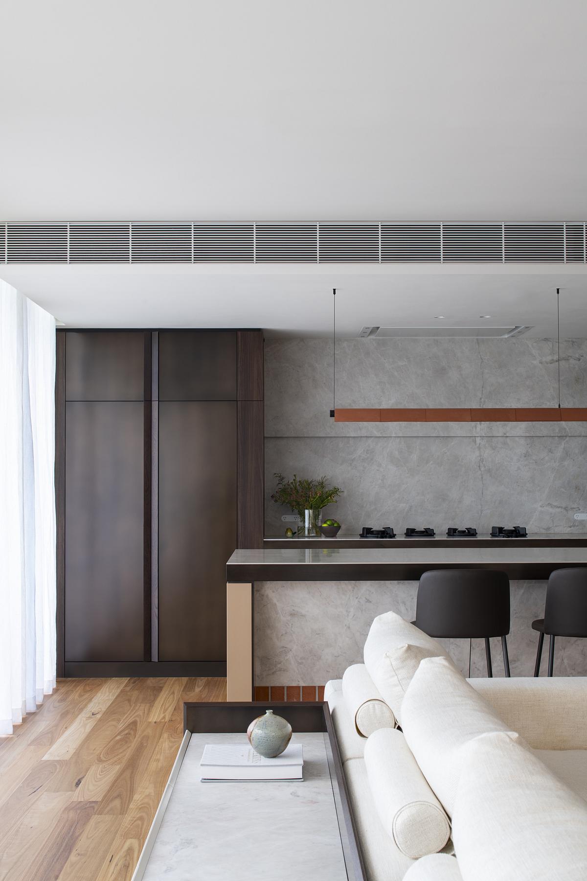 New Sydney kitchen features bench top with pop-up bar - The Interiors ...