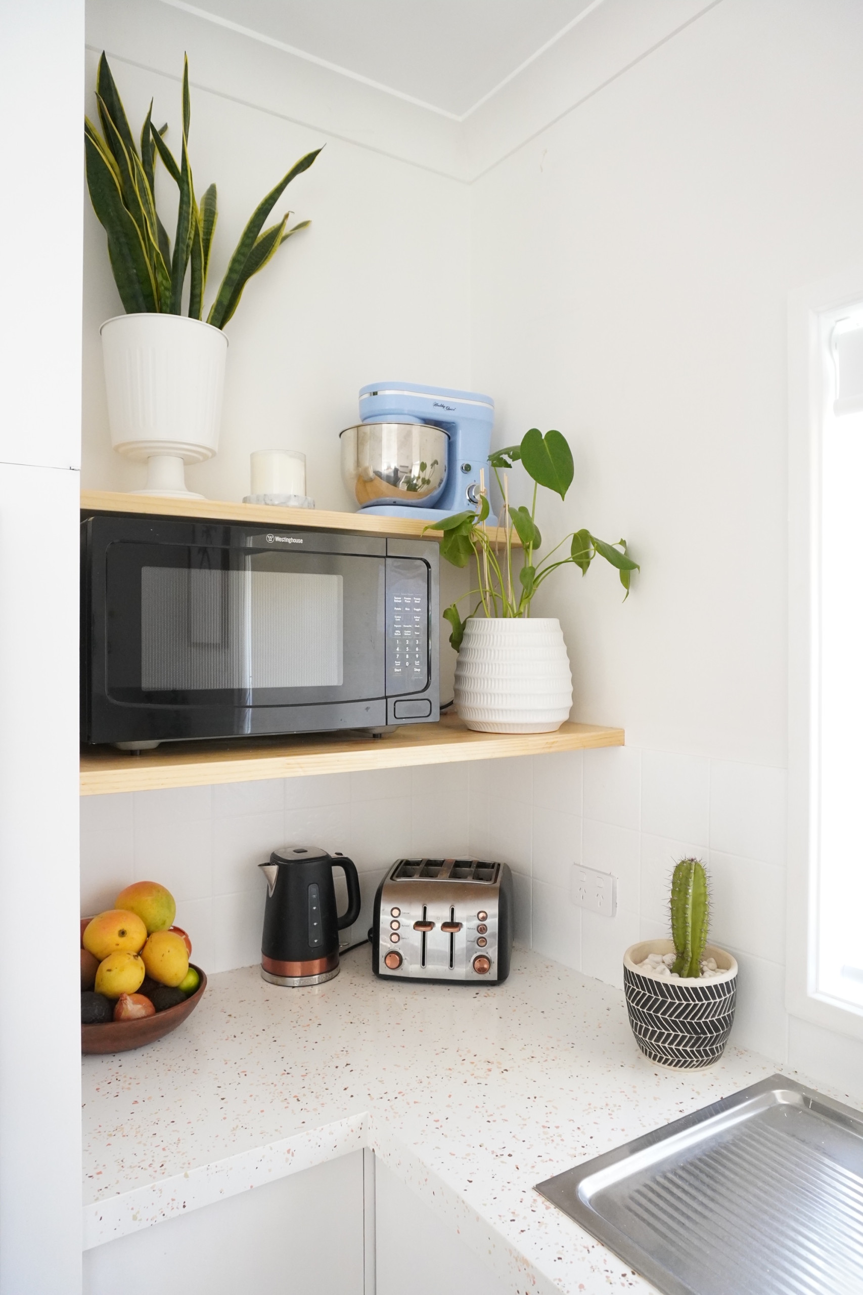 Kitchen transformed with Kmart paint chips hack and $500