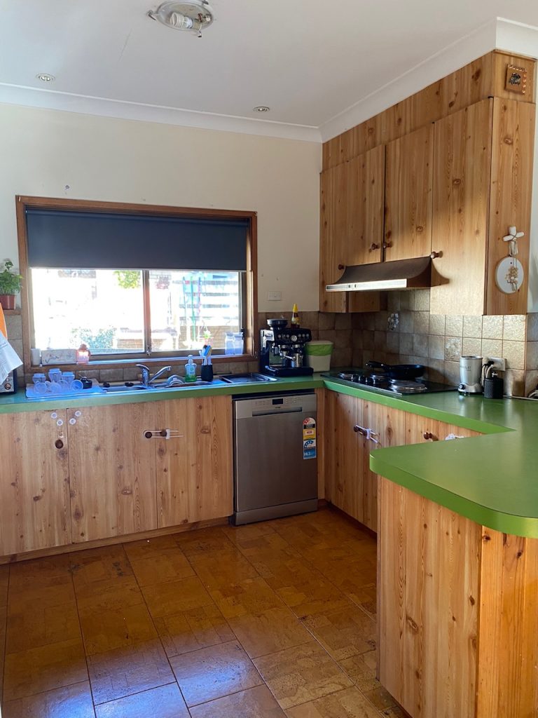 Kitchen transformed with Kmart paint chips hack and $500