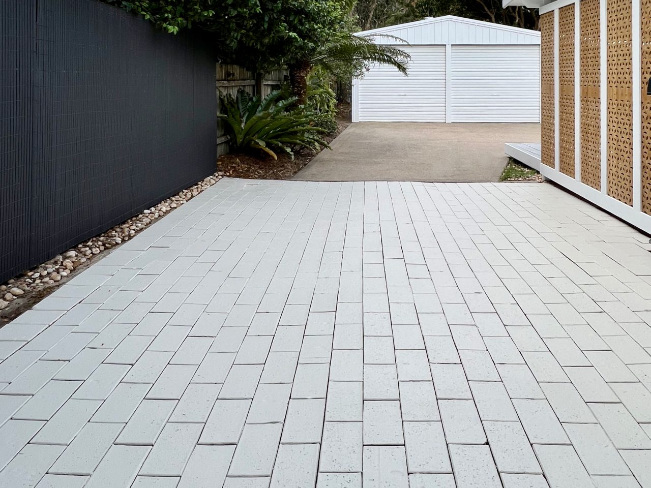 Save money painting concrete pavers instead of replacing them