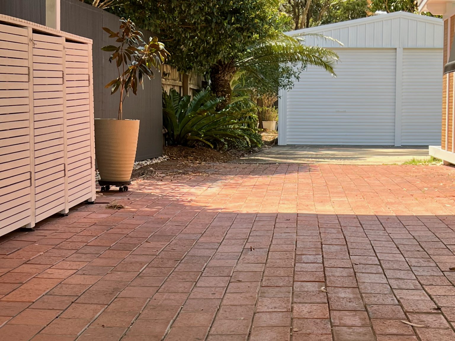 Save money painting concrete pavers instead of replacing them