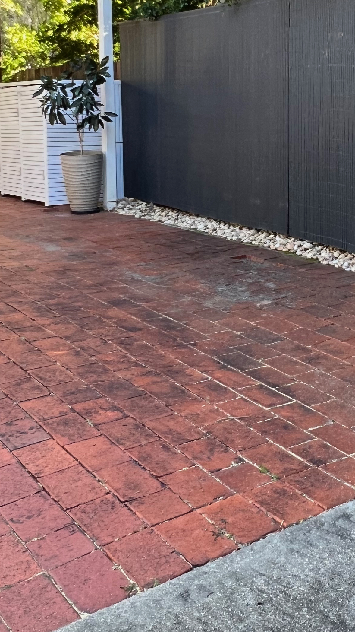 Save money painting concrete pavers instead of replacing them