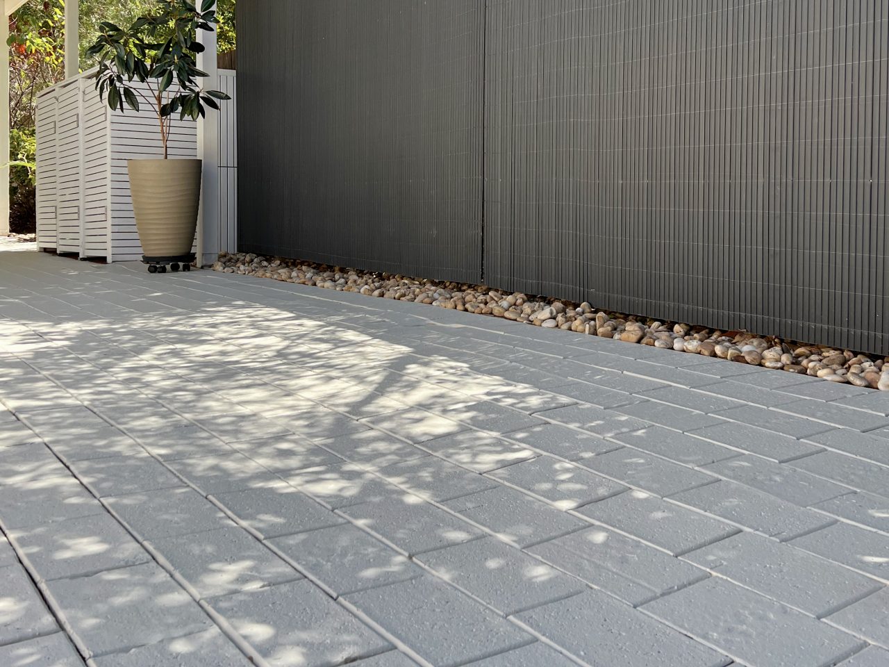 Save money painting concrete pavers instead of replacing them